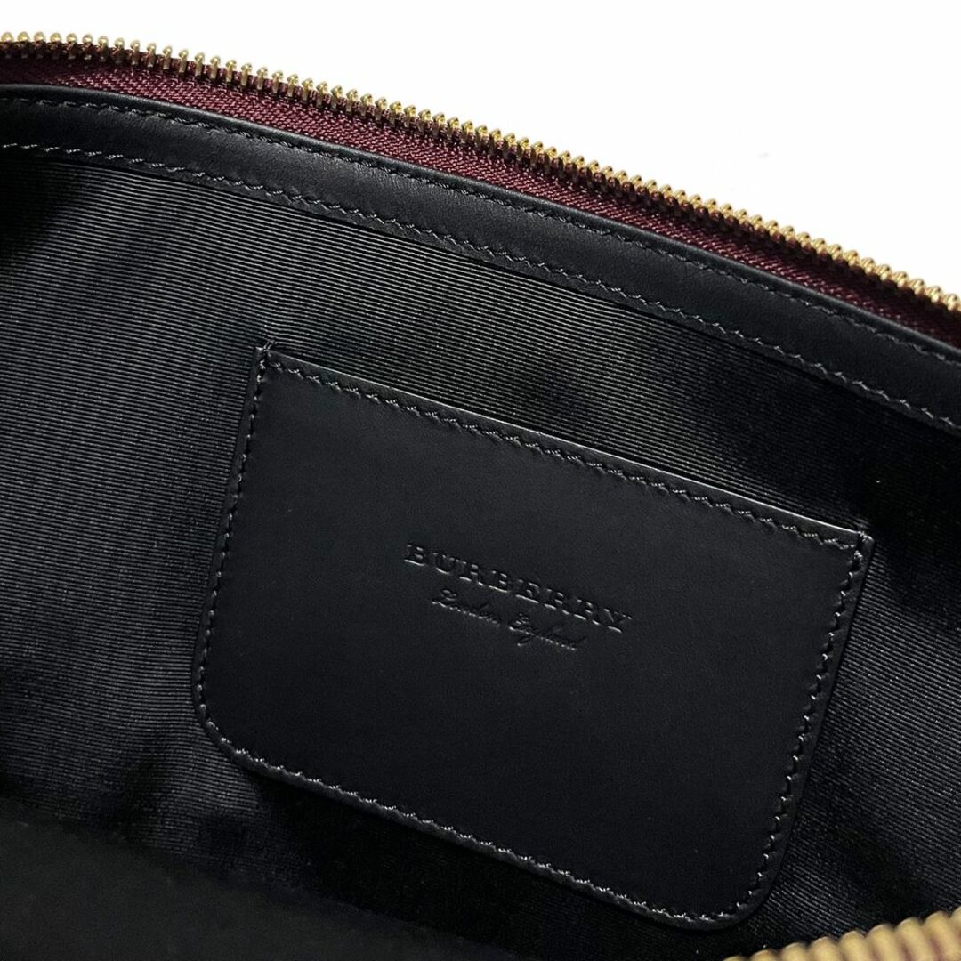 BURBERRY - バーバリー レザー チェック 装飾 スタッズ クラッチ BURBERRY - バーバリー レザー チェック 装飾 スタッズ クラッチ