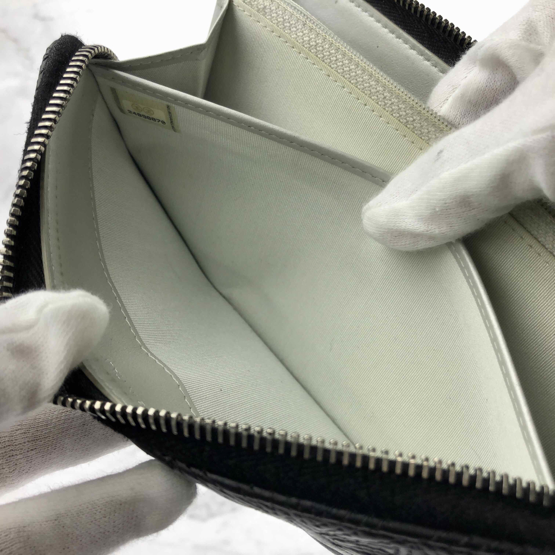 CHANEL - CHANEL シャネル 長財布 ブラック 星型エンボス加工の CHANEL - CHANEL シャネル 長財布 ブラック 星型エンボス加工の