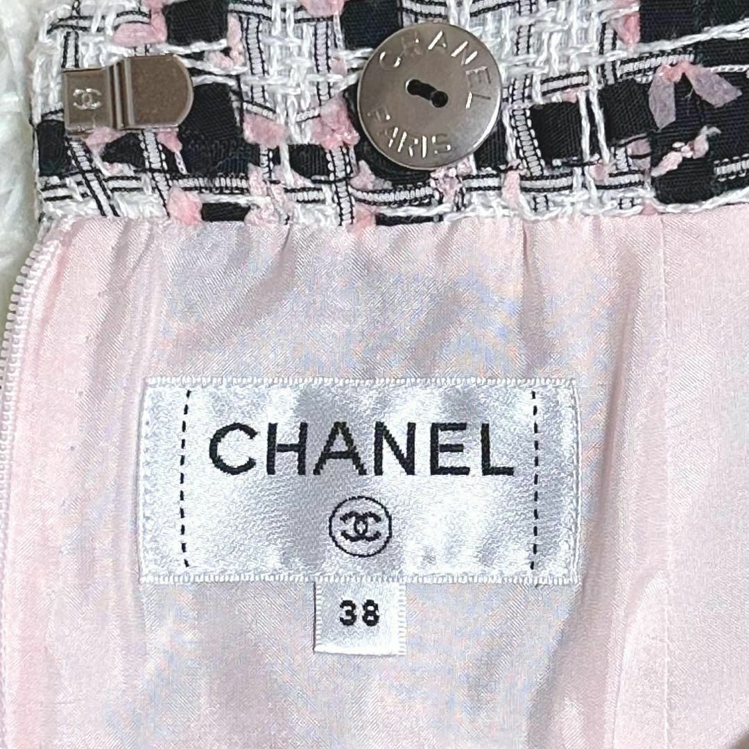 CHANEL - CHANEL ツイード ひざ丈スカート チェック ココボタン CHANEL - CHANEL ツイード ひざ丈スカート チェック ココボタン