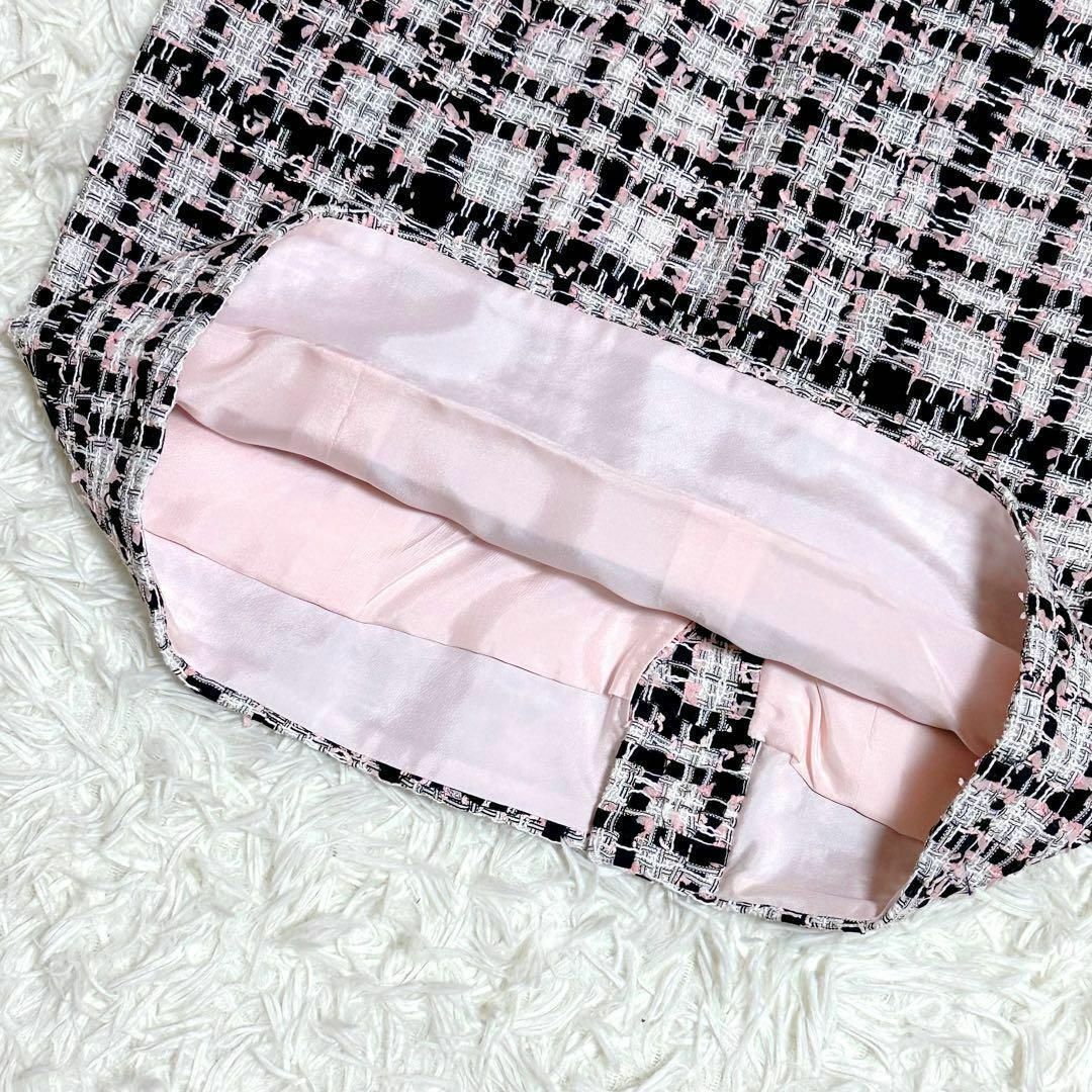 CHANEL - CHANEL ツイード ひざ丈スカート チェック ココボタン CHANEL - CHANEL ツイード ひざ丈スカート チェック ココボタン