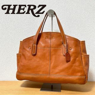 HERZ - HERZ ヘルツ レザートートバッグ キャメルの通販|ラクマ HERZ - HERZ ヘルツ レザートートバッグ キャメルの通販|ラクマ