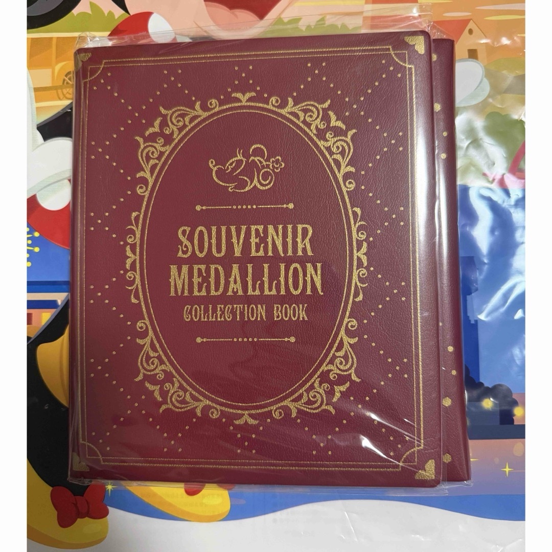 Disney - ディズニー スーベニアメダルブック メダルケース Disney - ディズニー スーベニアメダルブック メダルケース